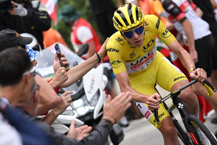 Fan throws potato chips at Tour de France leader Tadej Pogačar
